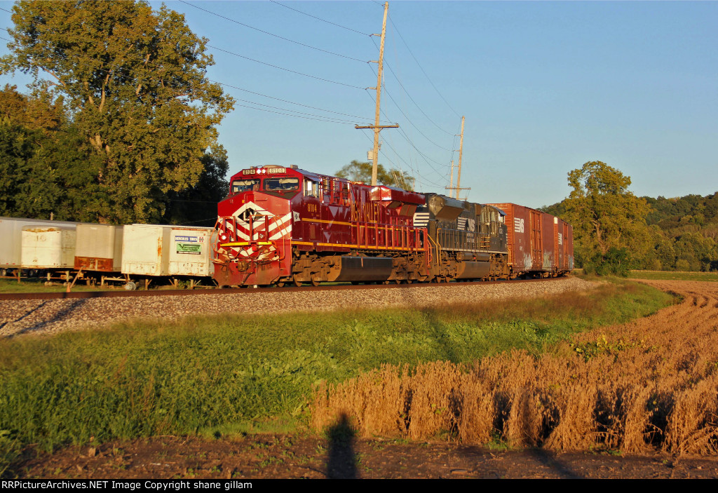 NS 8104 Hurries a WB freight train.